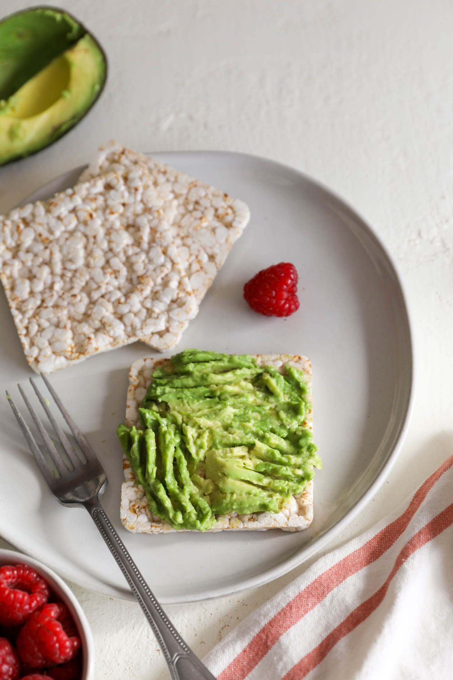 Avocado Raspberry Rice Cake Toast - Flora & Vino