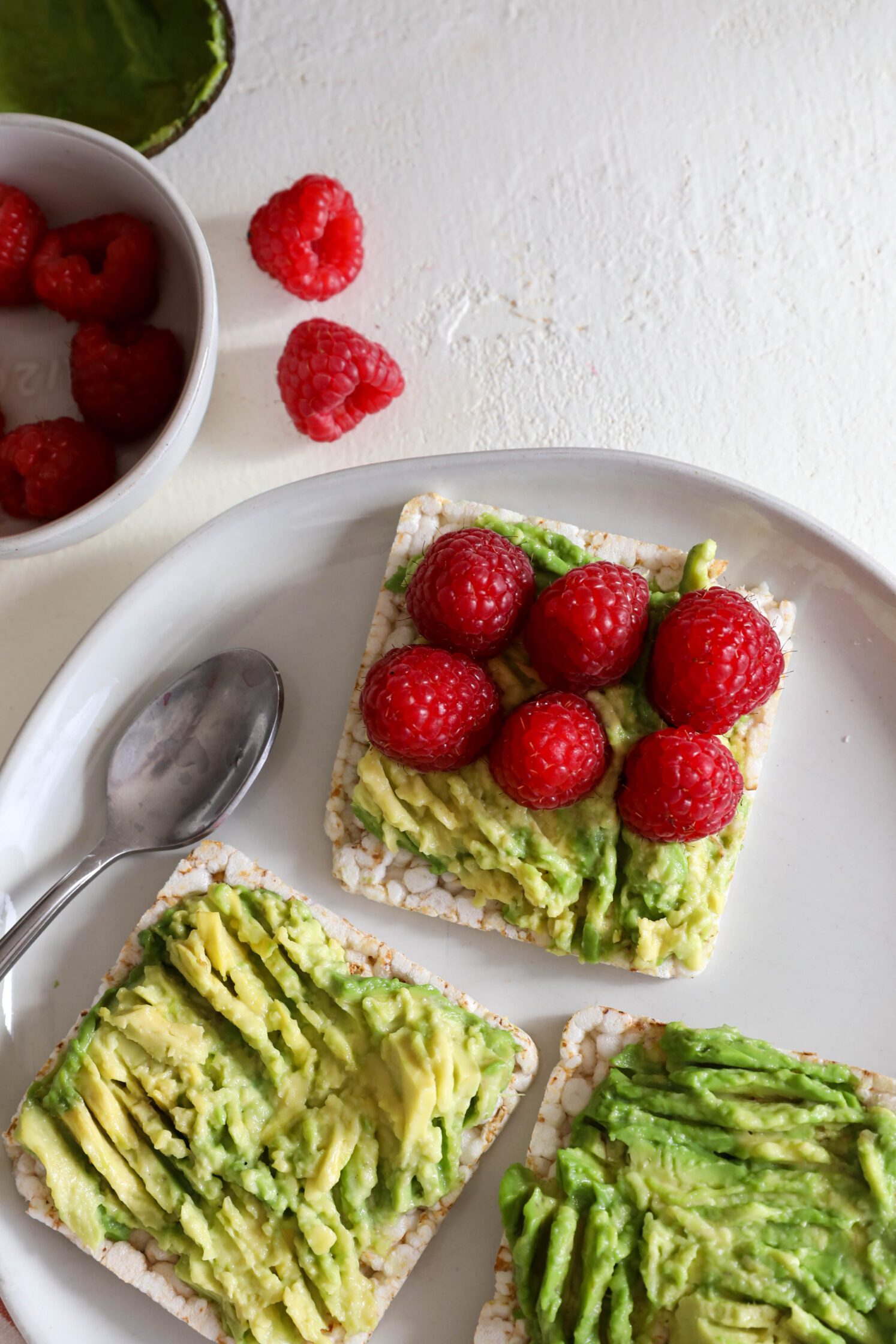 Avocado Raspberry Rice Cake Toast - Flora & Vino